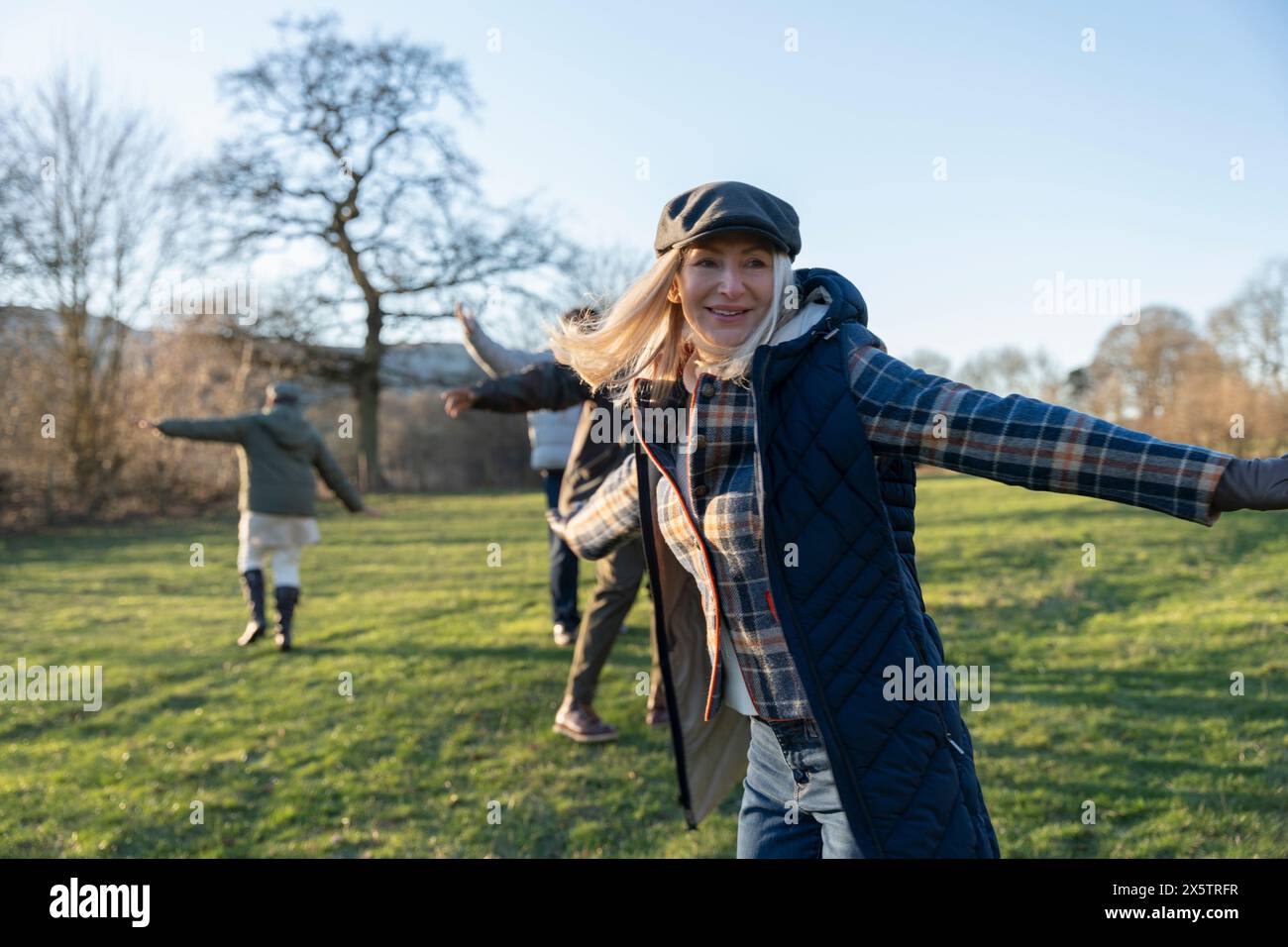 Woman arms outstretched outdoors hi-res stock photography and images ...