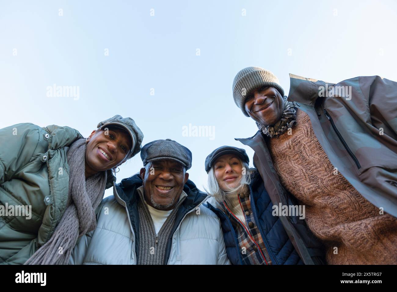 Smiling people looking at camera Stock Photo - Alamy