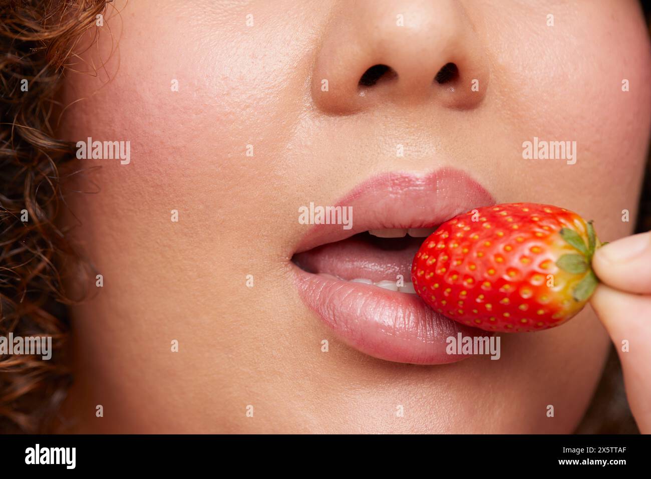 Woman mouth lips fruit hi-res stock photography and images - Alamy