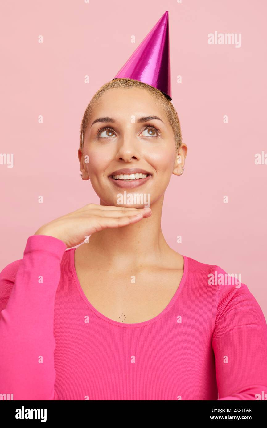 Woman pink hat hi-res stock photography and images - Alamy