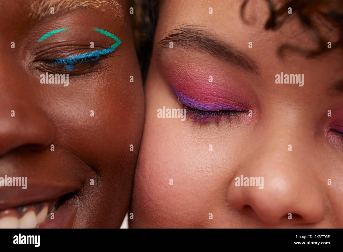 Two young women face hi-res stock photography and images - Alamy