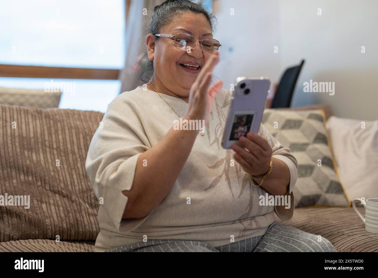 Senior woman video call using hi-res stock photography and images - Alamy