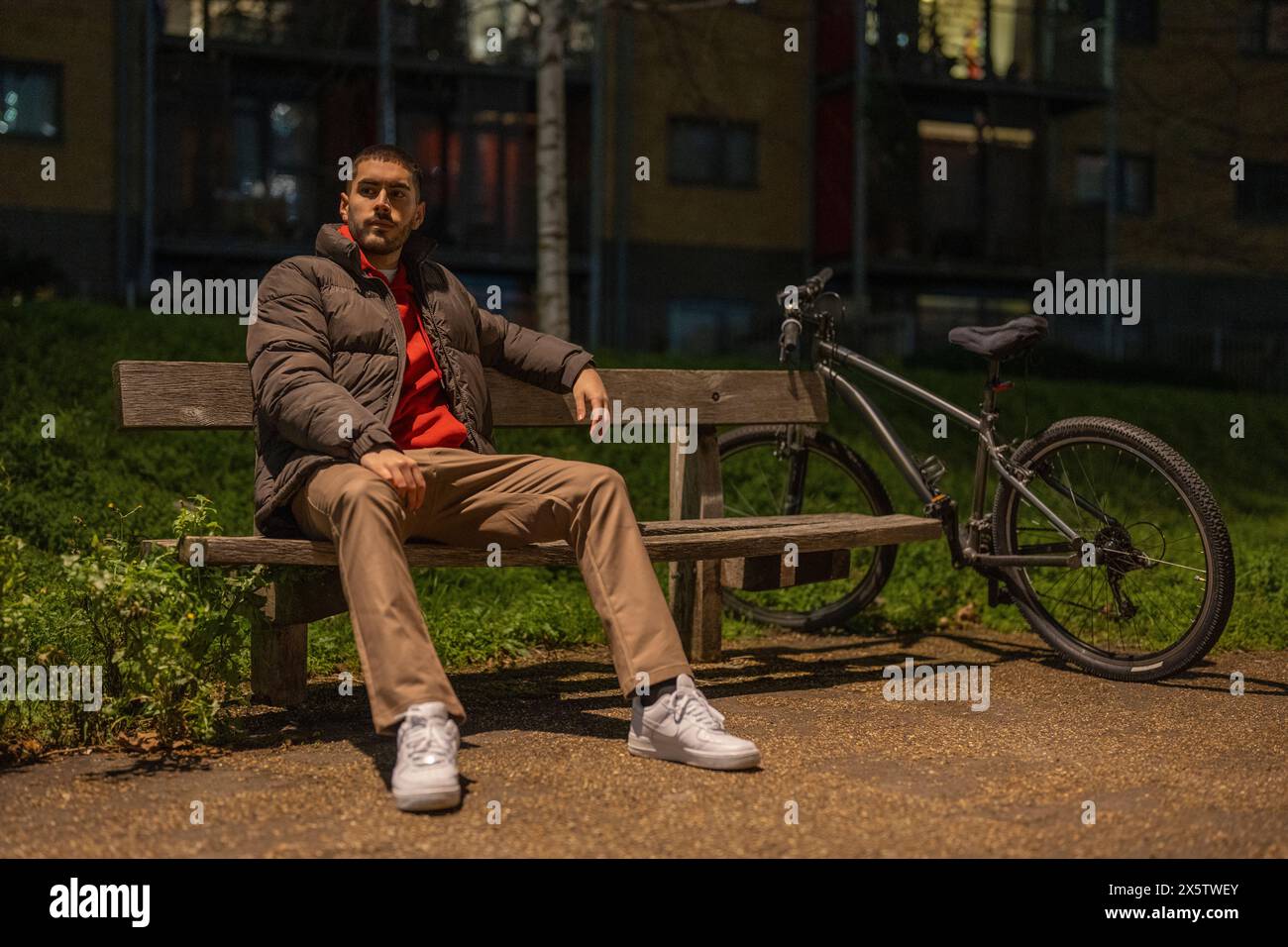 Man on white bench hi-res stock photography and images - Alamy