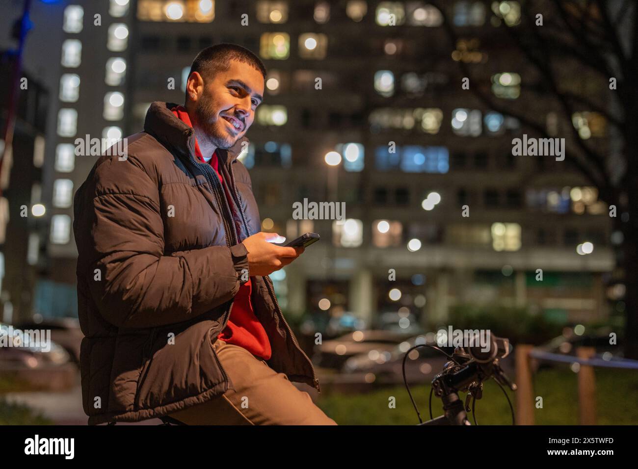 Side view young man using hi-res stock photography and images - Alamy