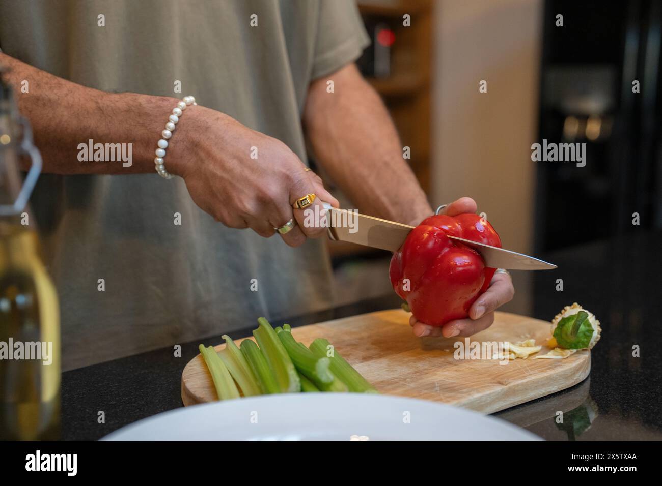 Person cutting up plate hi-res stock photography and images - Alamy