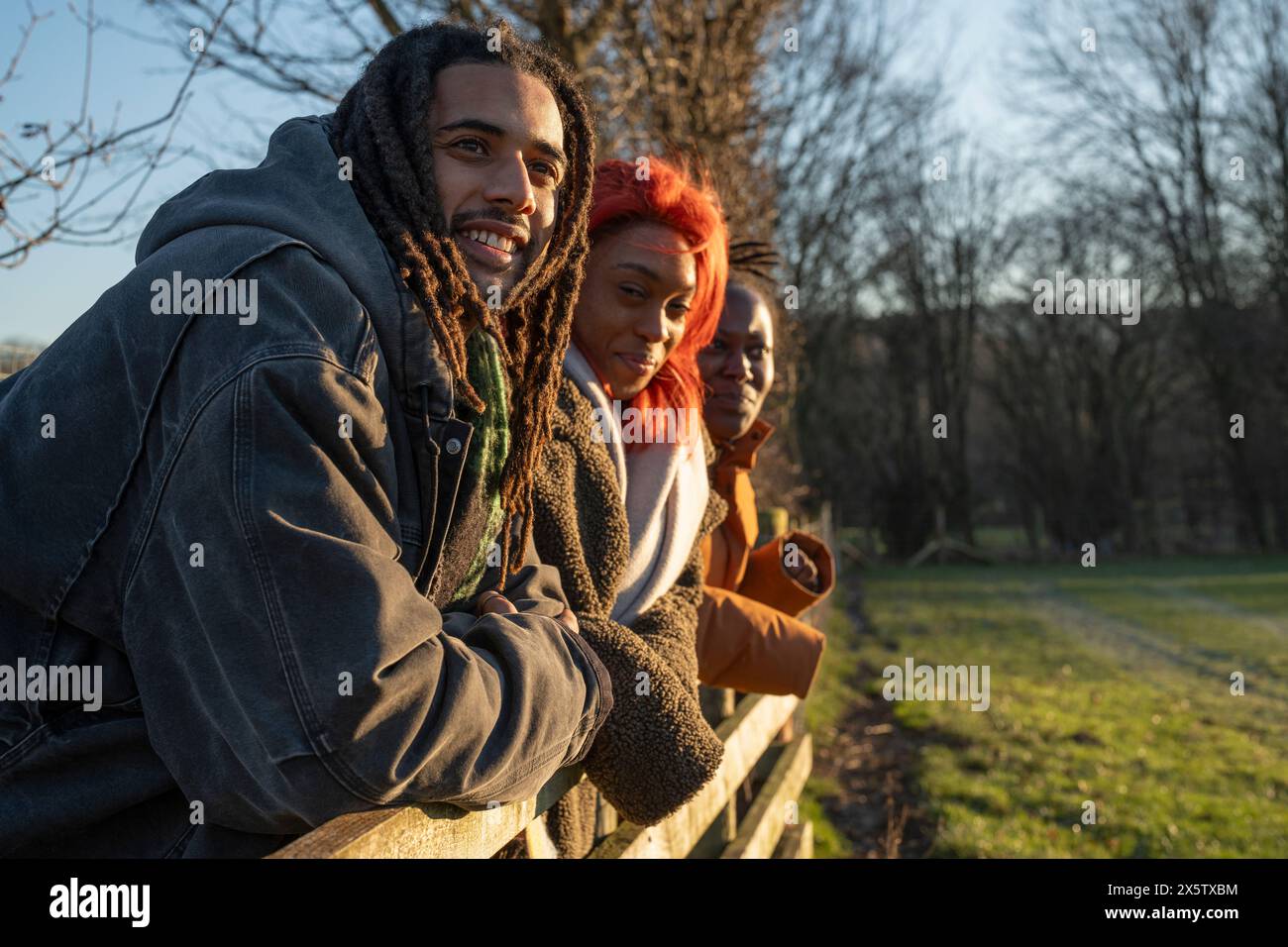Group standing in countryside hi-res stock photography and images - Alamy