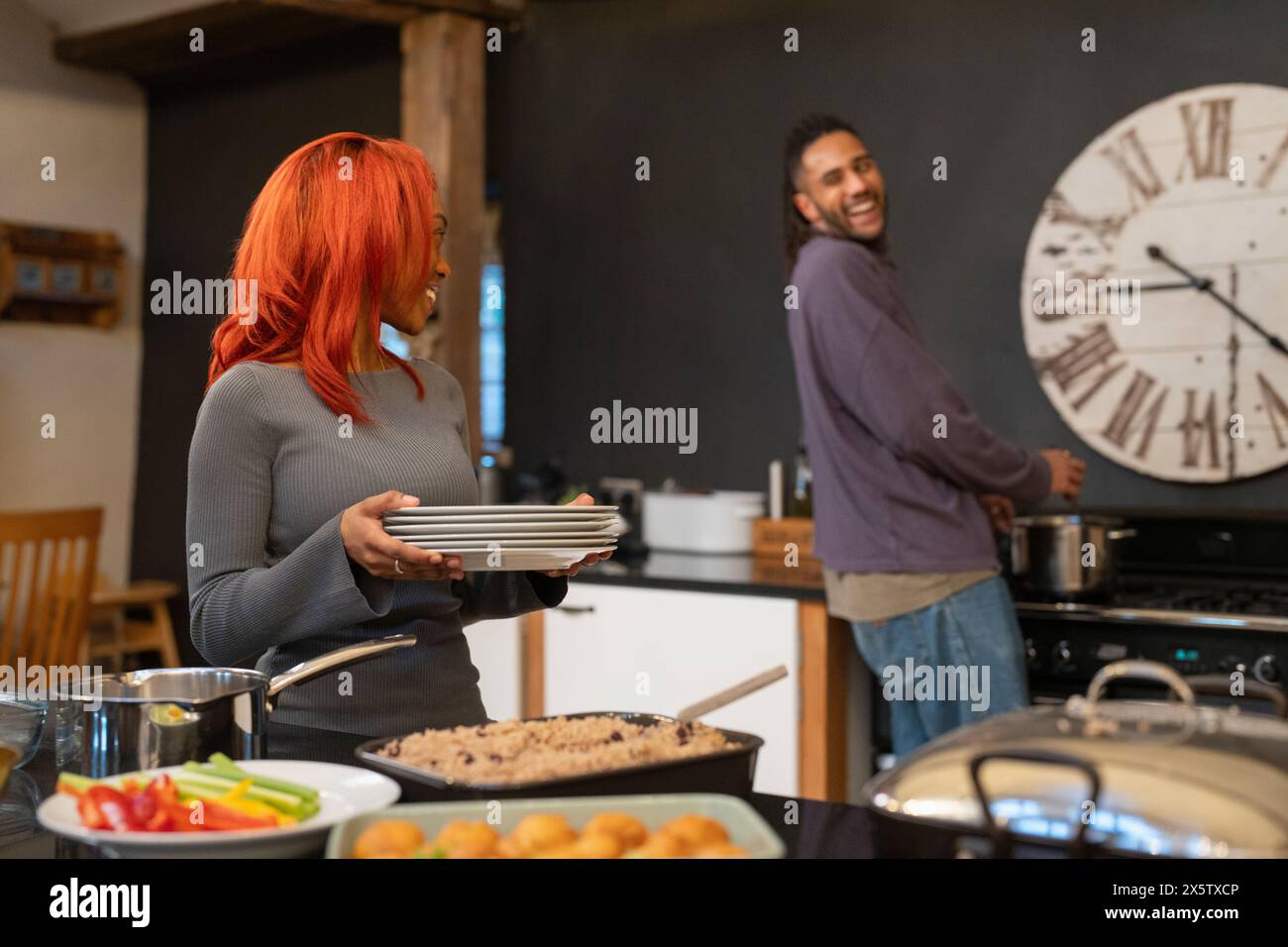 Two women prepare food hi-res stock photography and images - Alamy