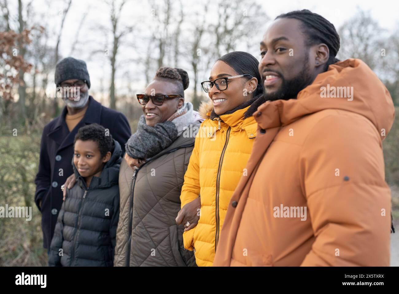 Three generation family walking together in rural area Stock Photo - Alamy