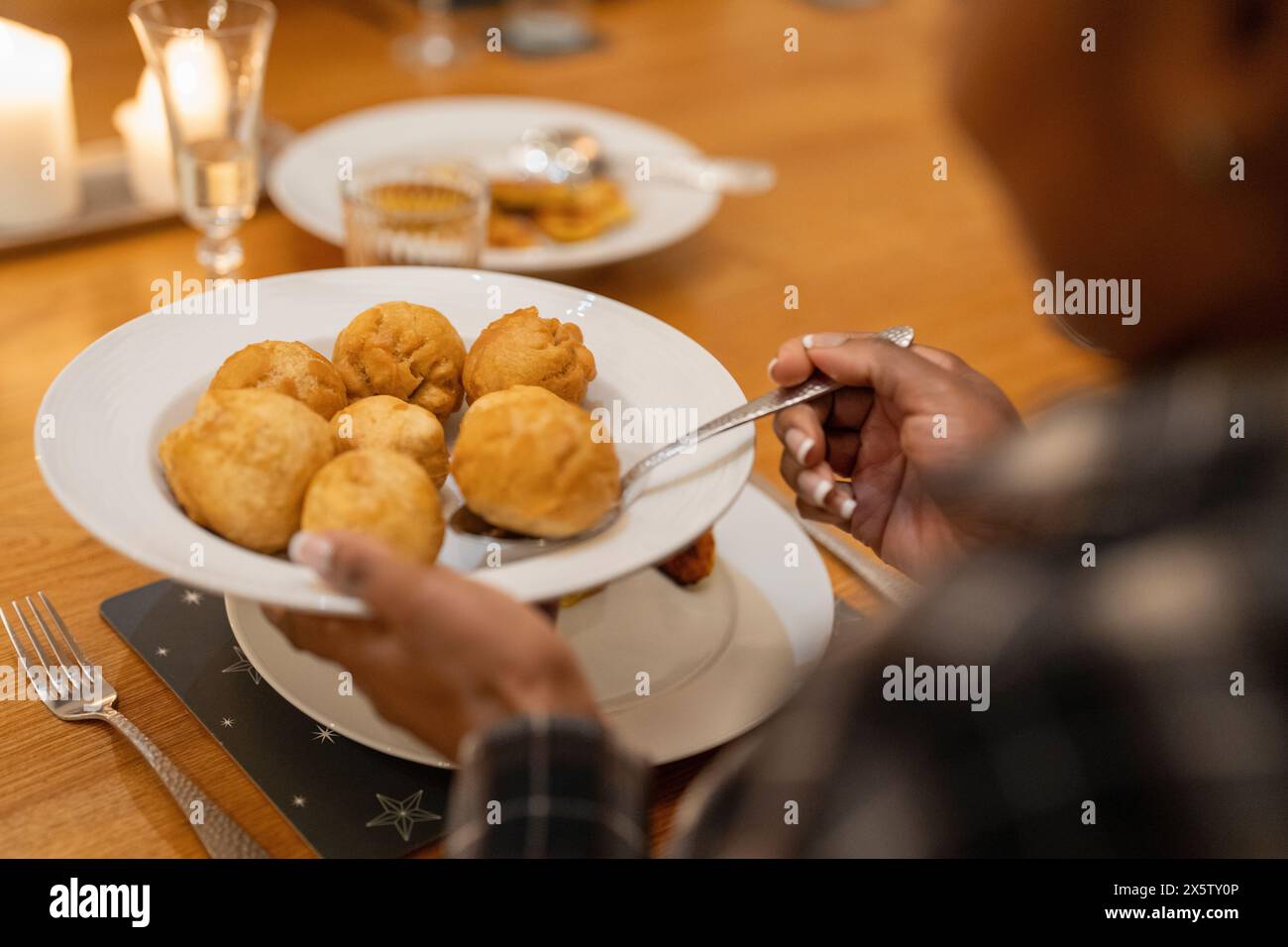 Woman eating dinner at home Stock Photo - Alamy