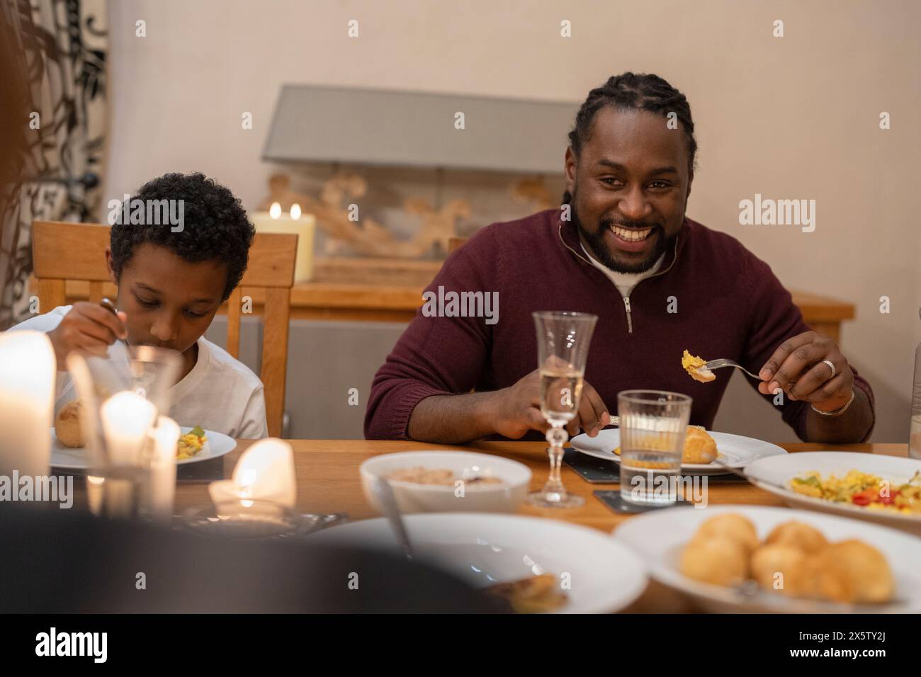 Father son eating dinner hi-res stock photography and images - Alamy