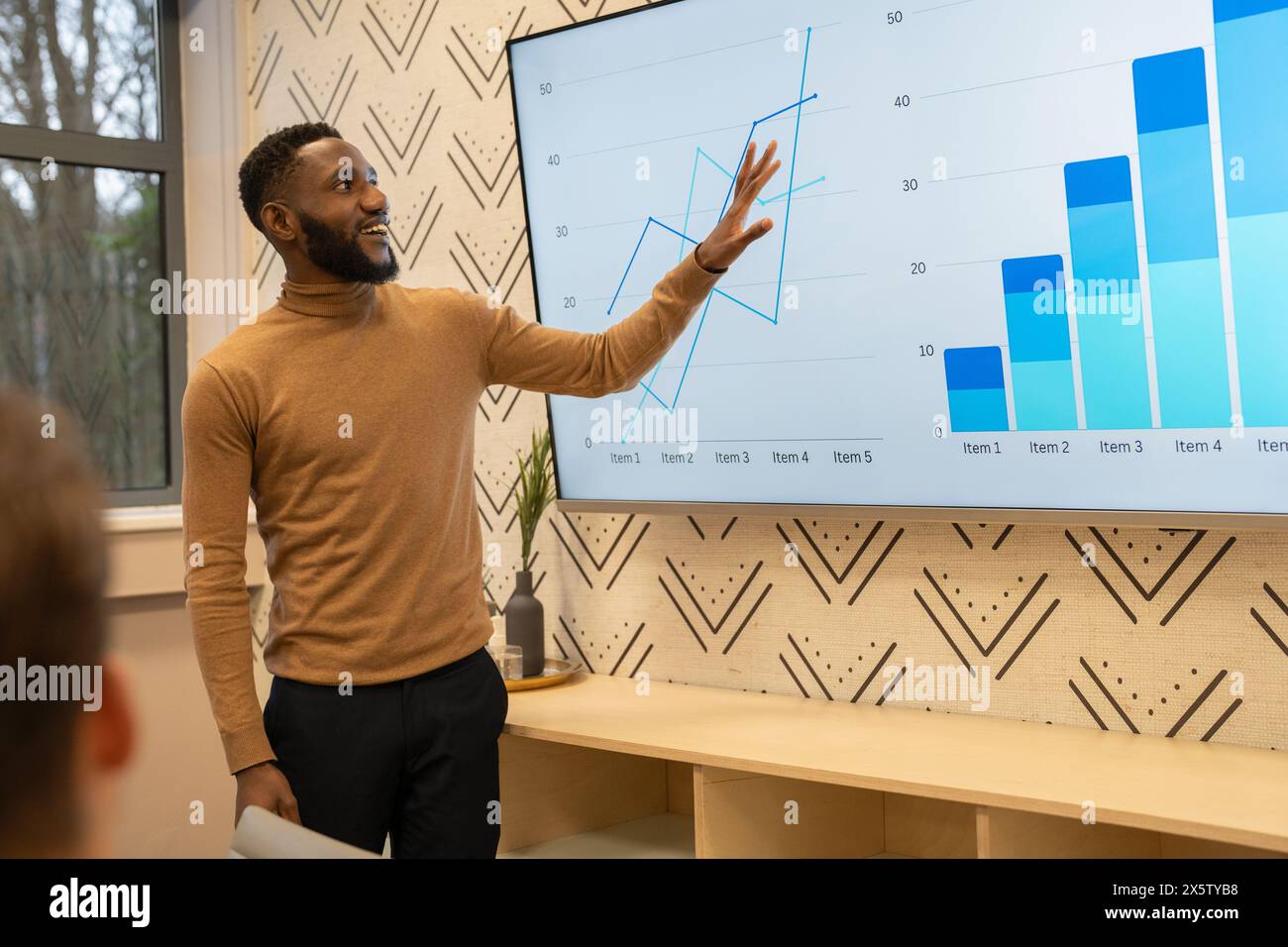 Young businessman in presentation hi-res stock photography and images ...