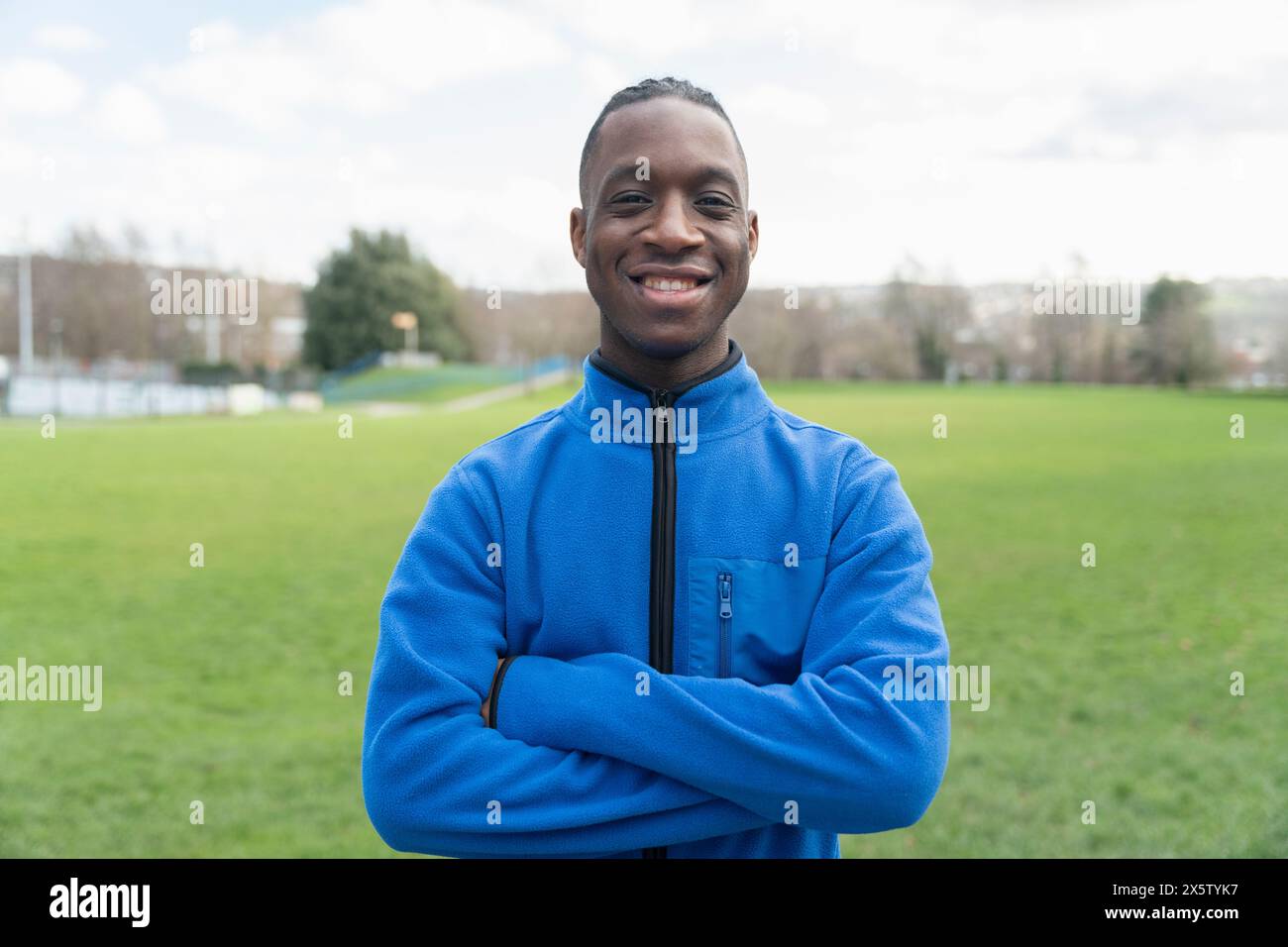 Portrait smiling athlete standing hi-res stock photography and images ...