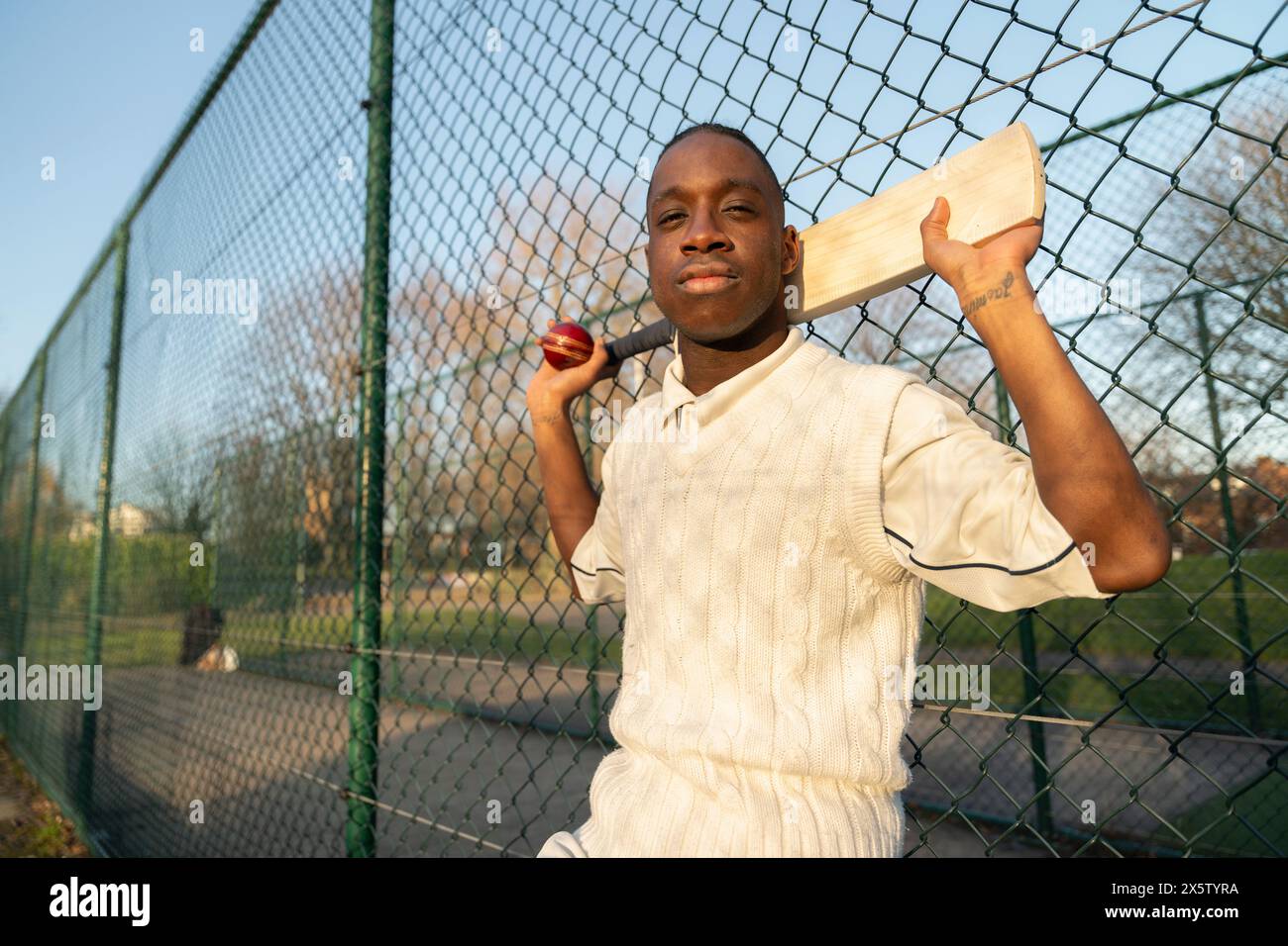 Leaning on cricket bat hi-res stock photography and images - Alamy