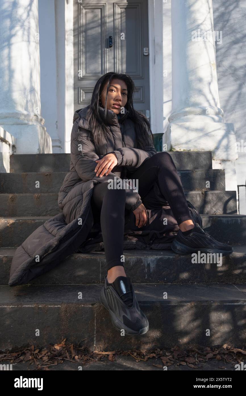 Sitting on front door steps hi-res stock photography and images - Alamy