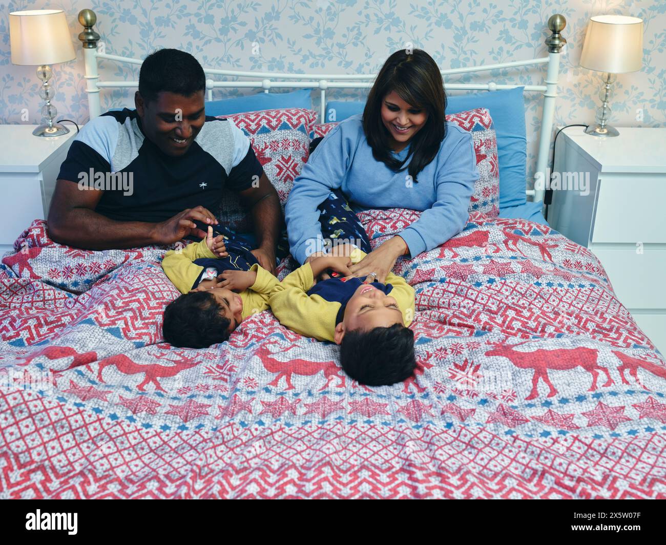Parents tickling hi-res stock photography and images - Alamy