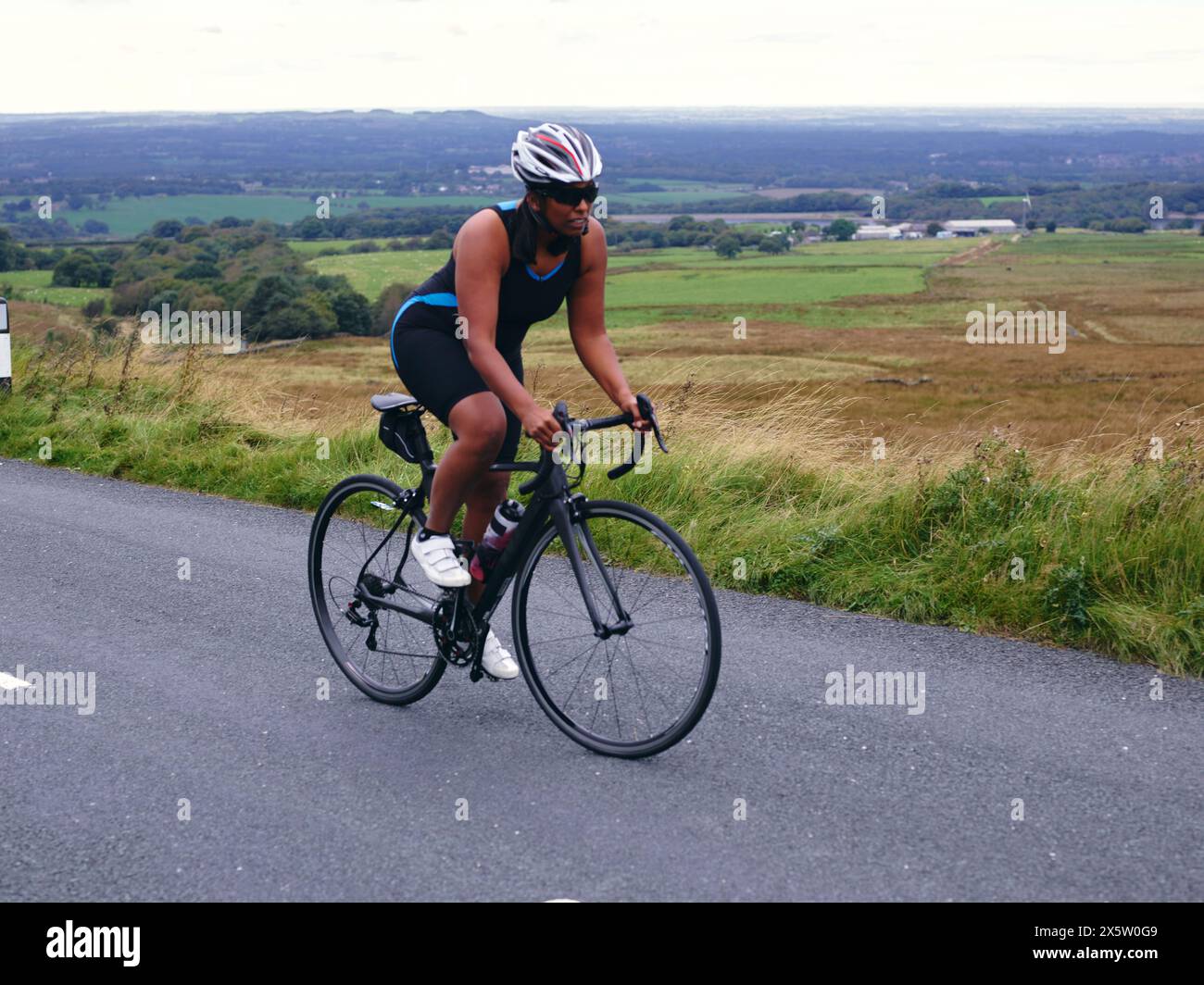 Female asian cyclist hi-res stock photography and images - Alamy