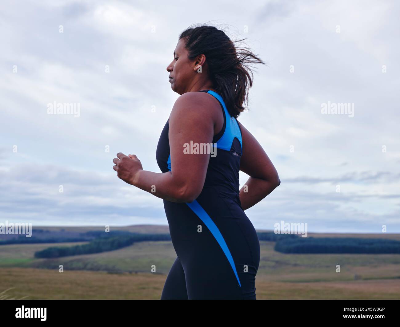 Person running in uk landscape hi-res stock photography and images - Alamy