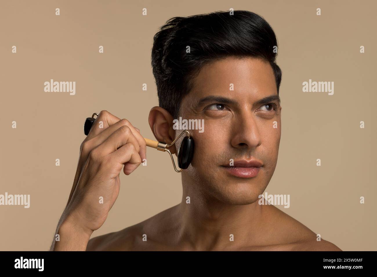 Man using roller hi-res stock photography and images - Alamy