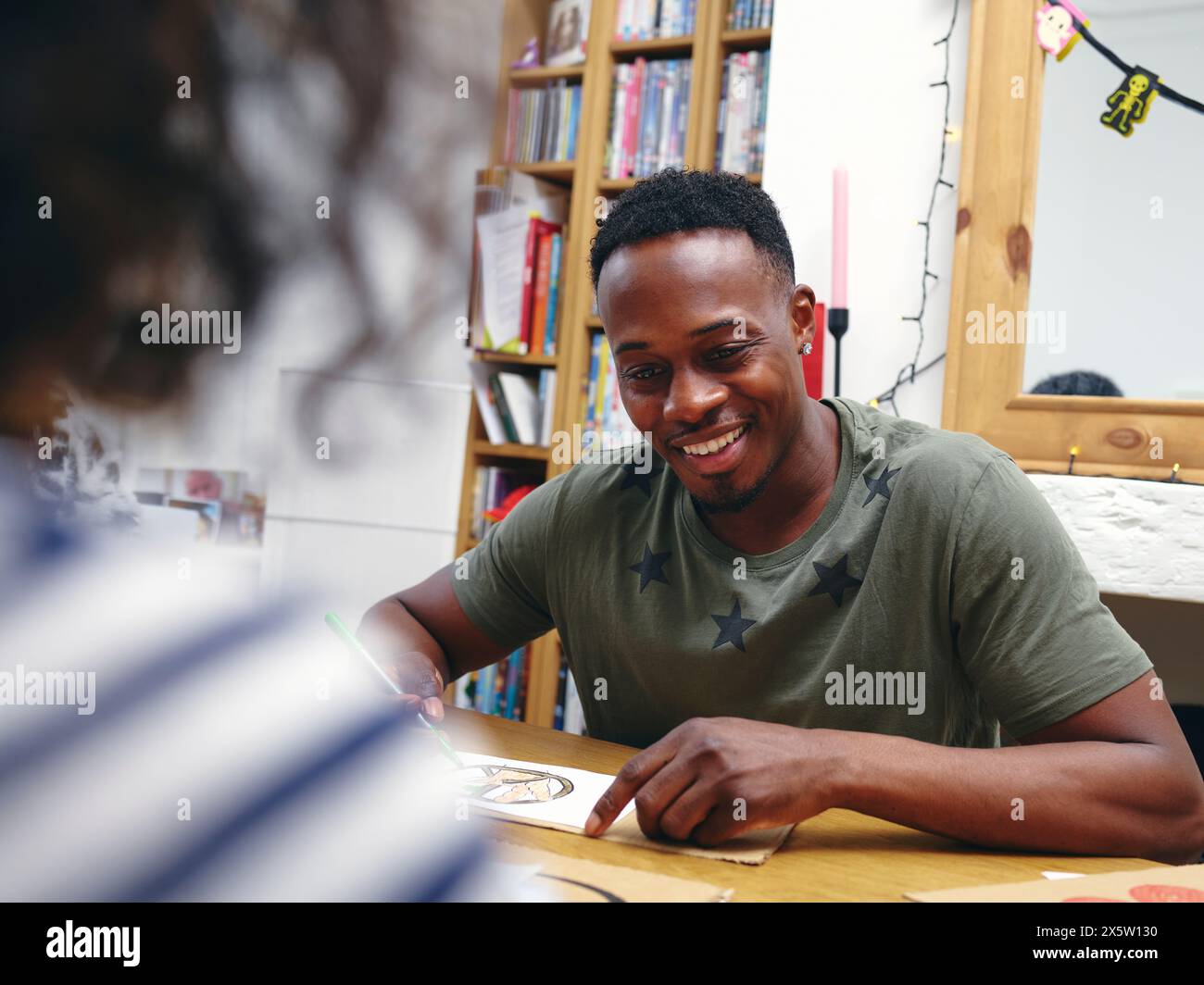 People sitting in room and making protest signs Stock Photo - Alamy