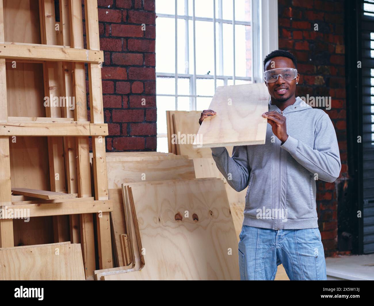 Carpenter looking wood plank hi-res stock photography and images - Alamy