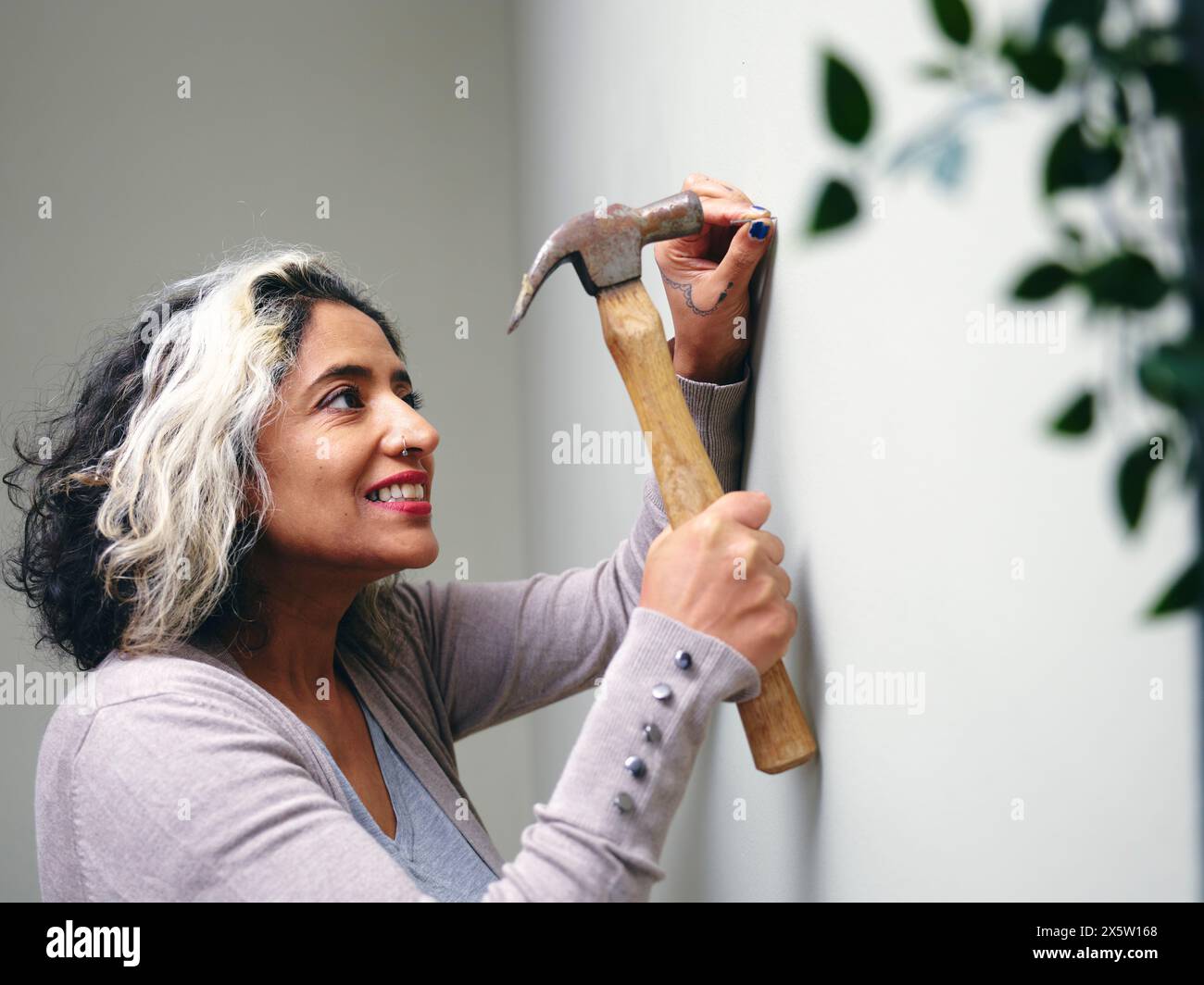 Hammering one hi-res stock photography and images - Alamy