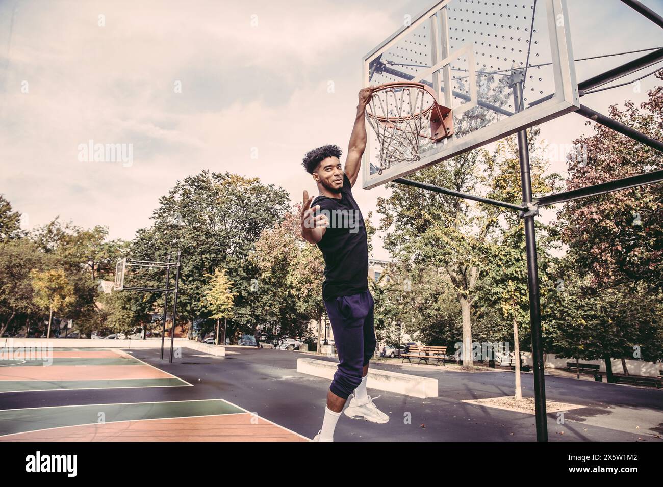 Portrait young man basketball hi-res stock photography and images - Alamy