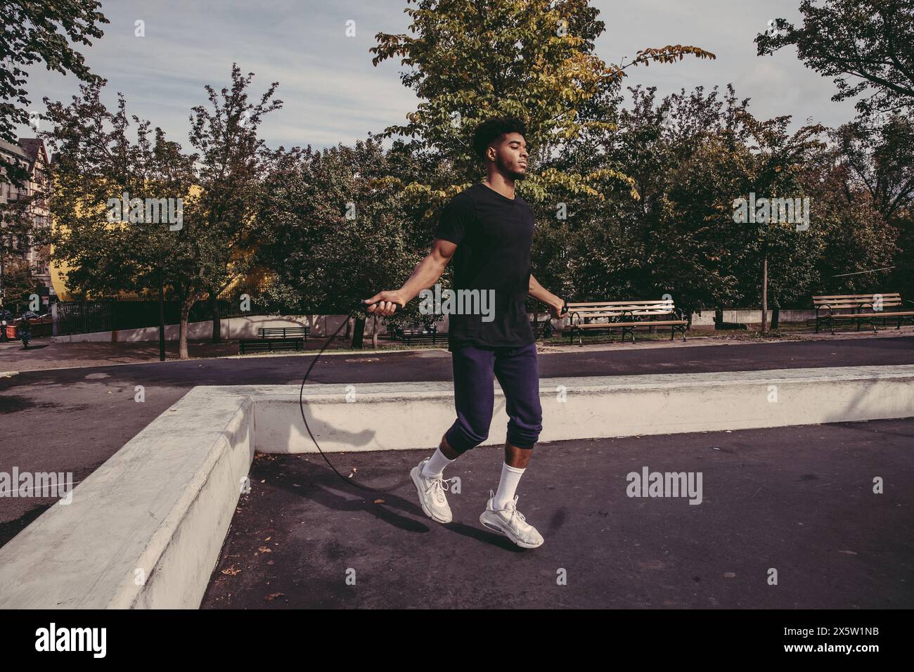 Black man jumping in hi-res stock photography and images - Alamy
