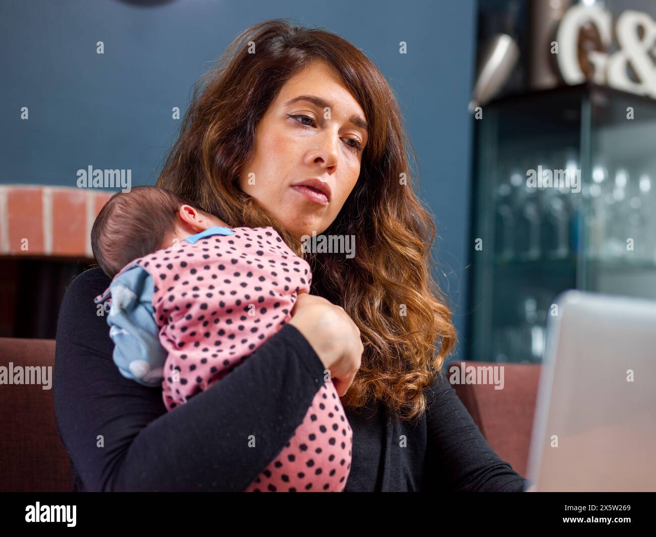 Woman work baby office hi-res stock photography and images - Alamy