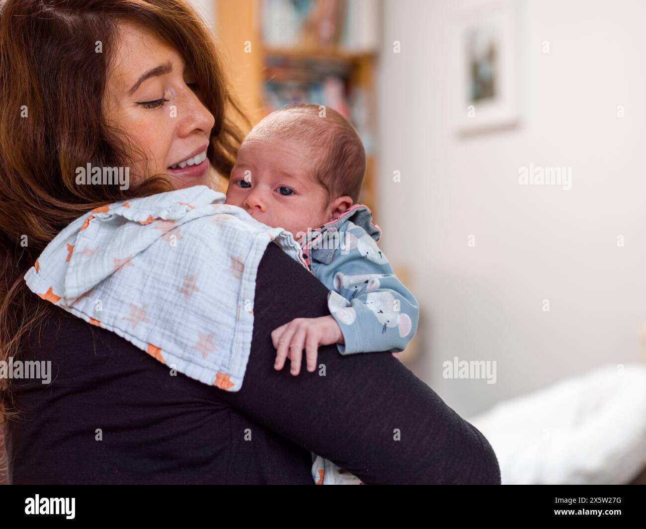 Infant care by mother hi-res stock photography and images - Alamy