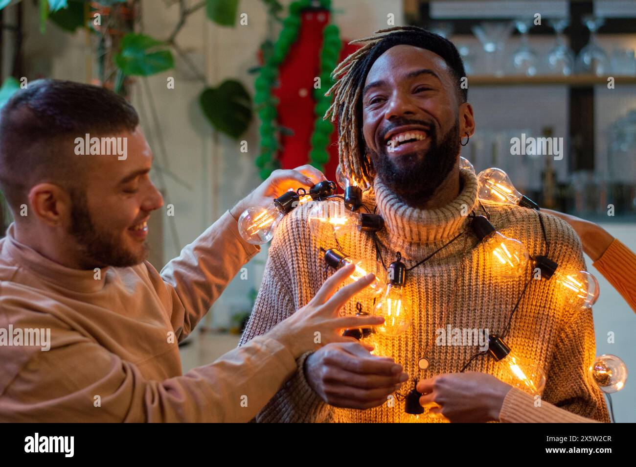Untangling string light hi-res stock photography and images - Alamy