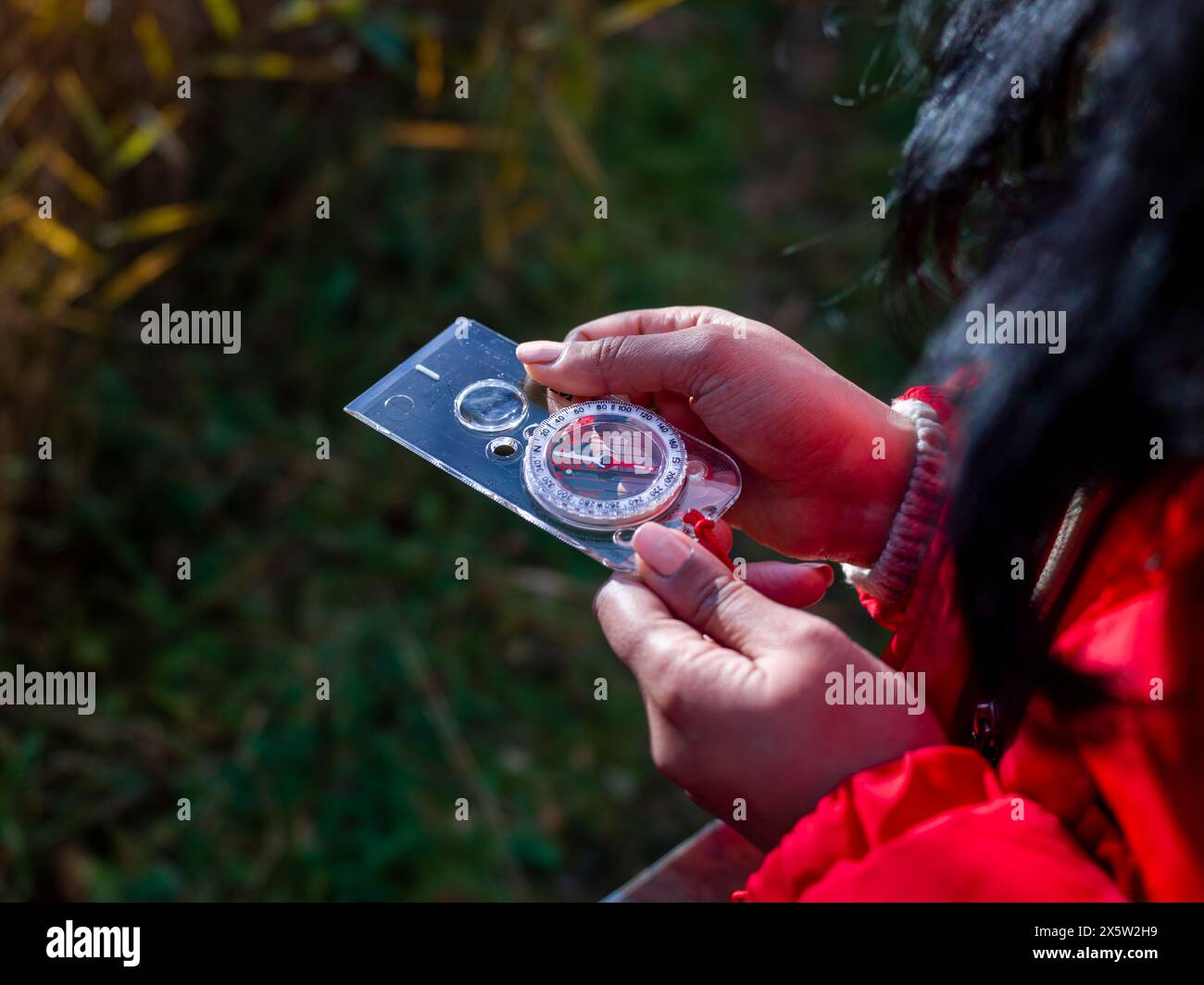 Female hiker using compass Stock Photo - Alamy Female hiker using compass Stock Photo - Alamy