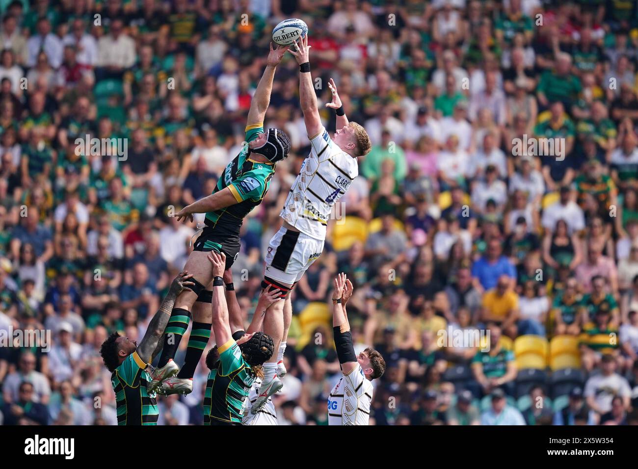 Northampton Saints' Alex Coles and Gloucester's Arthur Clark challenge ...