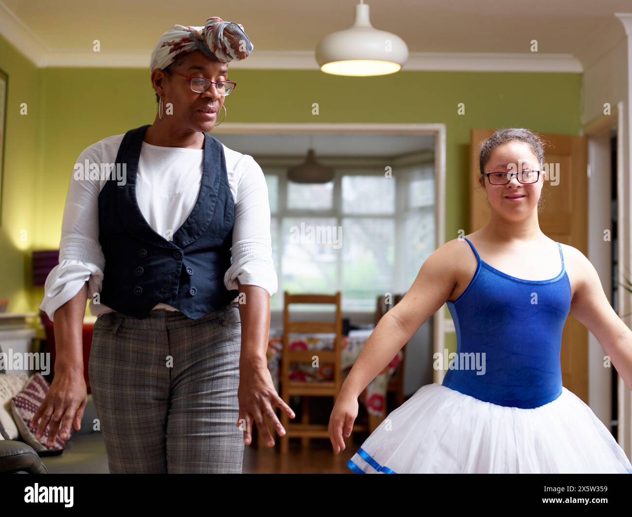 Mother and daughter with Down syndrome dancing ballet Stock Photo - Alamy