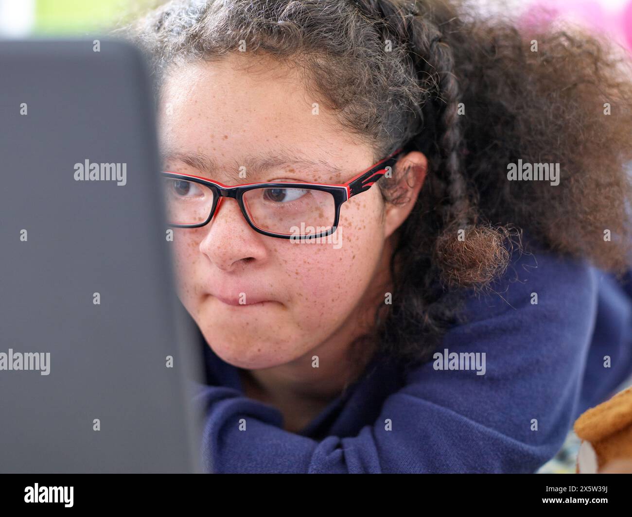 Down syndrome girl learning hi-res stock photography and images - Alamy