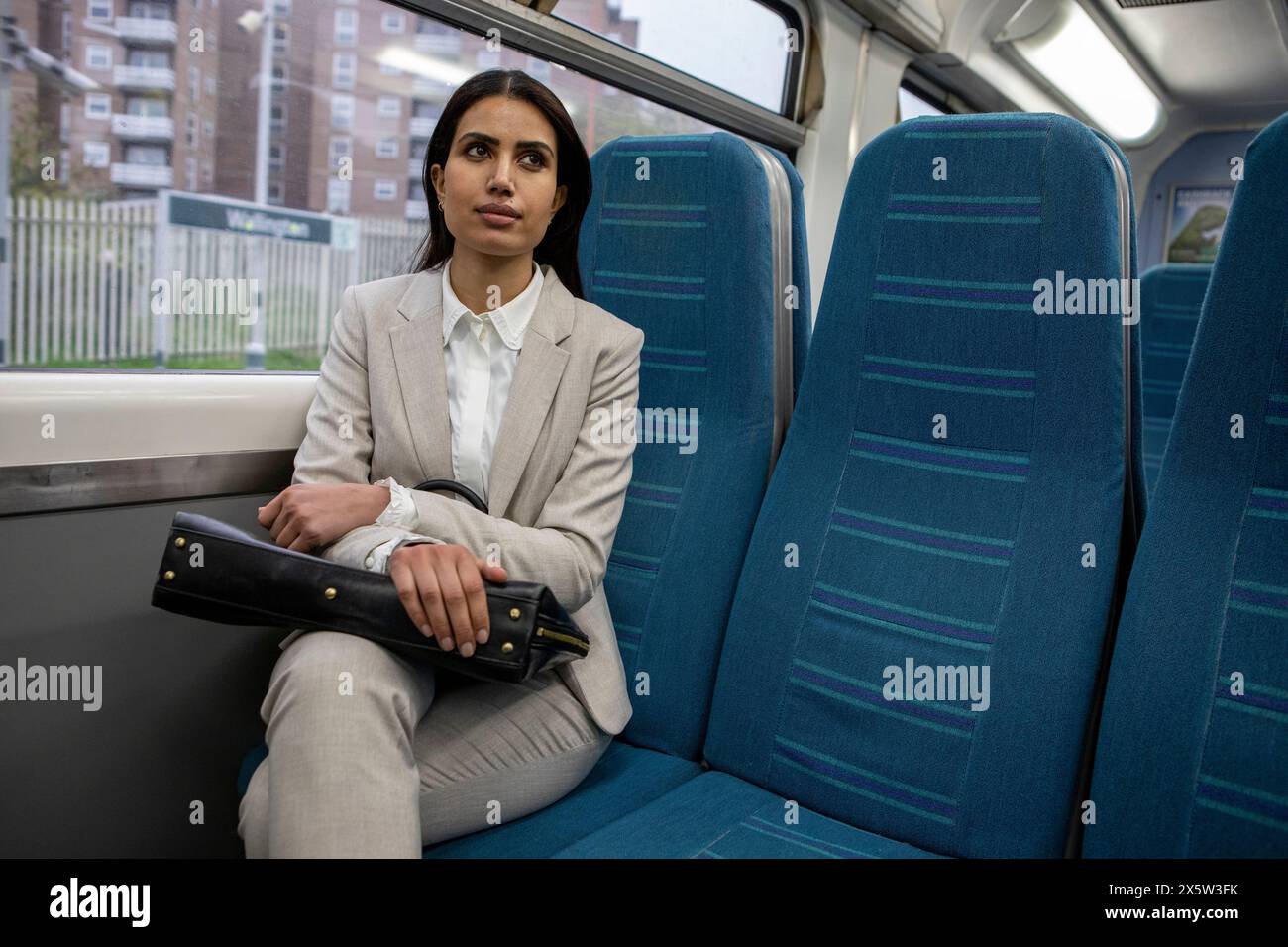 Crossed legs train hi-res stock photography and images - Alamy