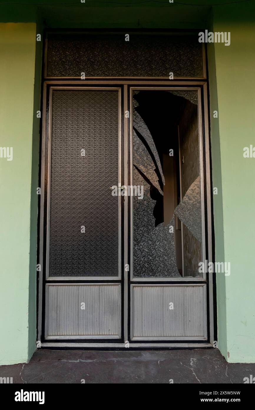 Broken glass door hi-res stock photography and images - Alamy