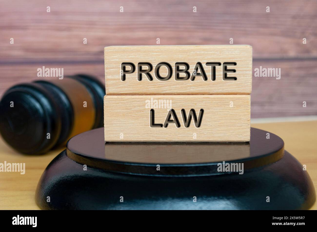 Probate law text engraved on wooden block with gavel background. Legal ...