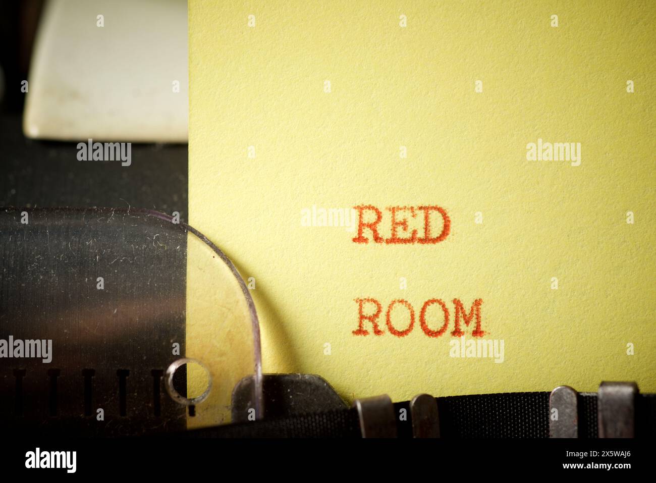Red room text written with a typewriter Stock Photo - Alamy