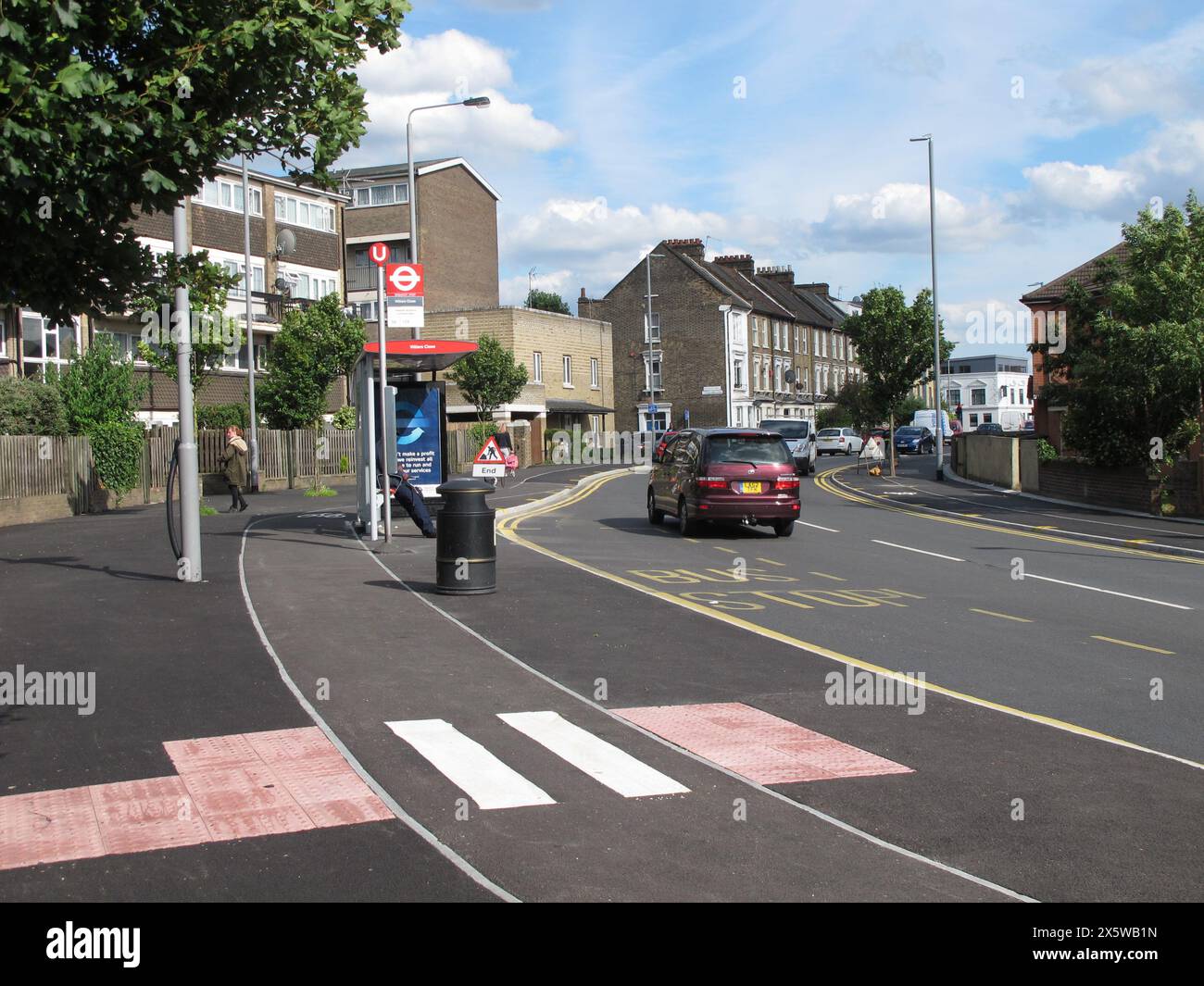 A 'floating' bus stop on Church Street, Leyton, London, UK. Cycle path ...