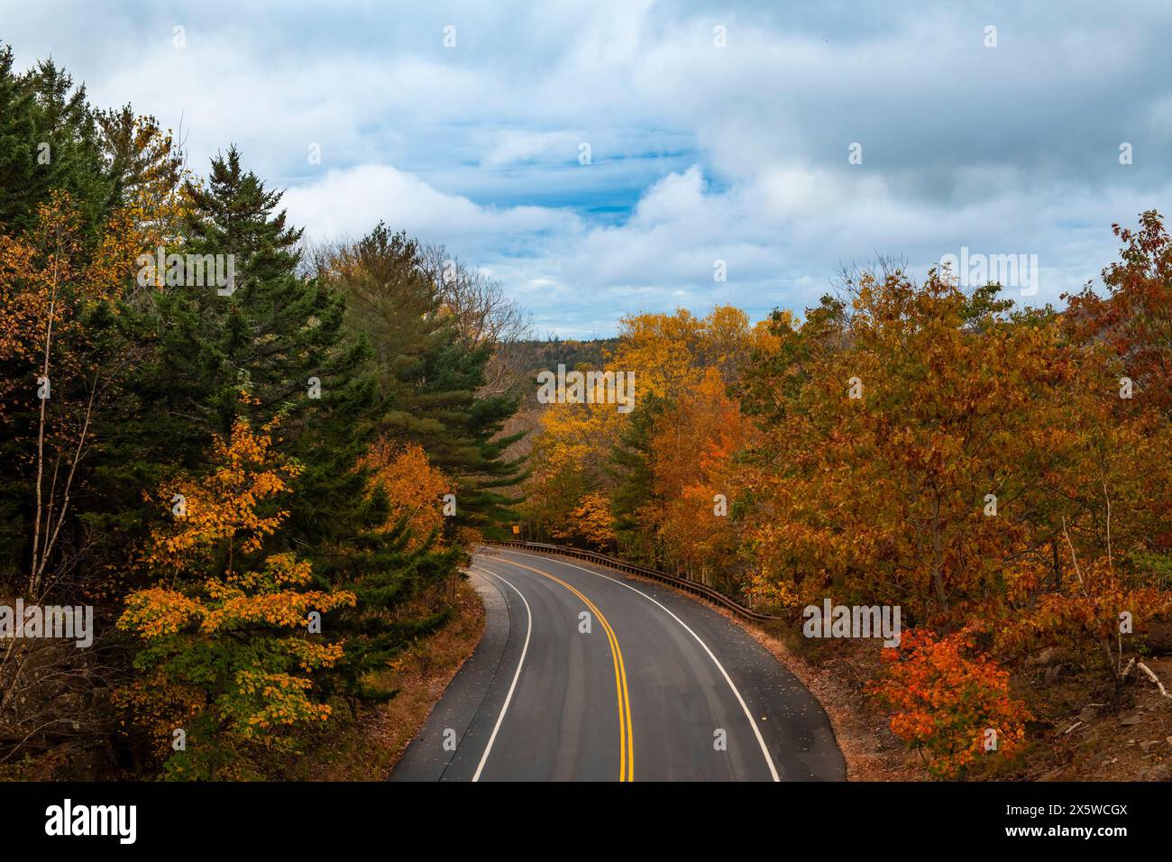 Scenic road along the Acadia National Park, Maine, USA, with the autumn ...
