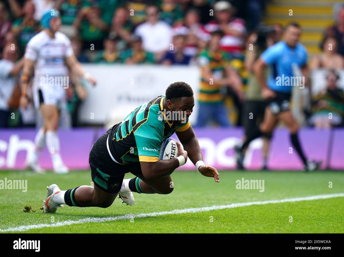 Northampton Saints' Emmanuel Iyogun scores a try during the Gallagher ...