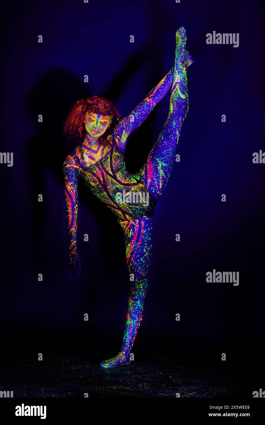 Body paint, dance and woman in studio for art, culture and stretching ...