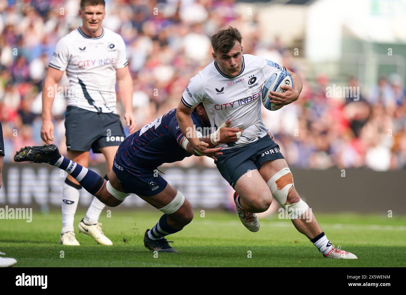 Saracens' Theo Dan is tackled by Bristol Bears' Steven Luatua during ...