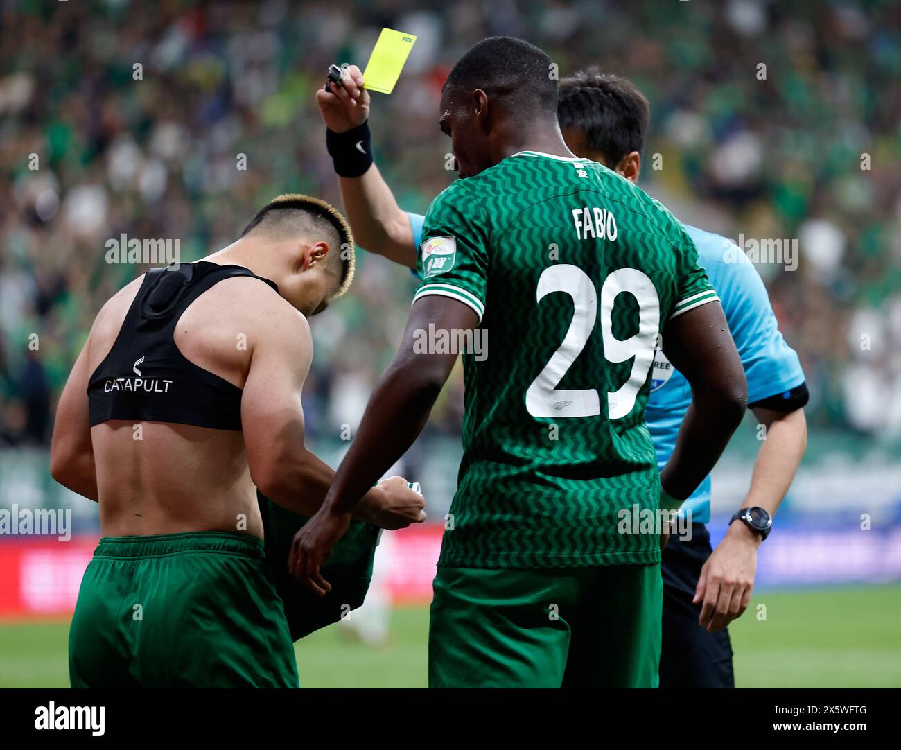 Beijing, China. 11th May, 2024. Fang Hao (L) of Beijing Guoan receives ...