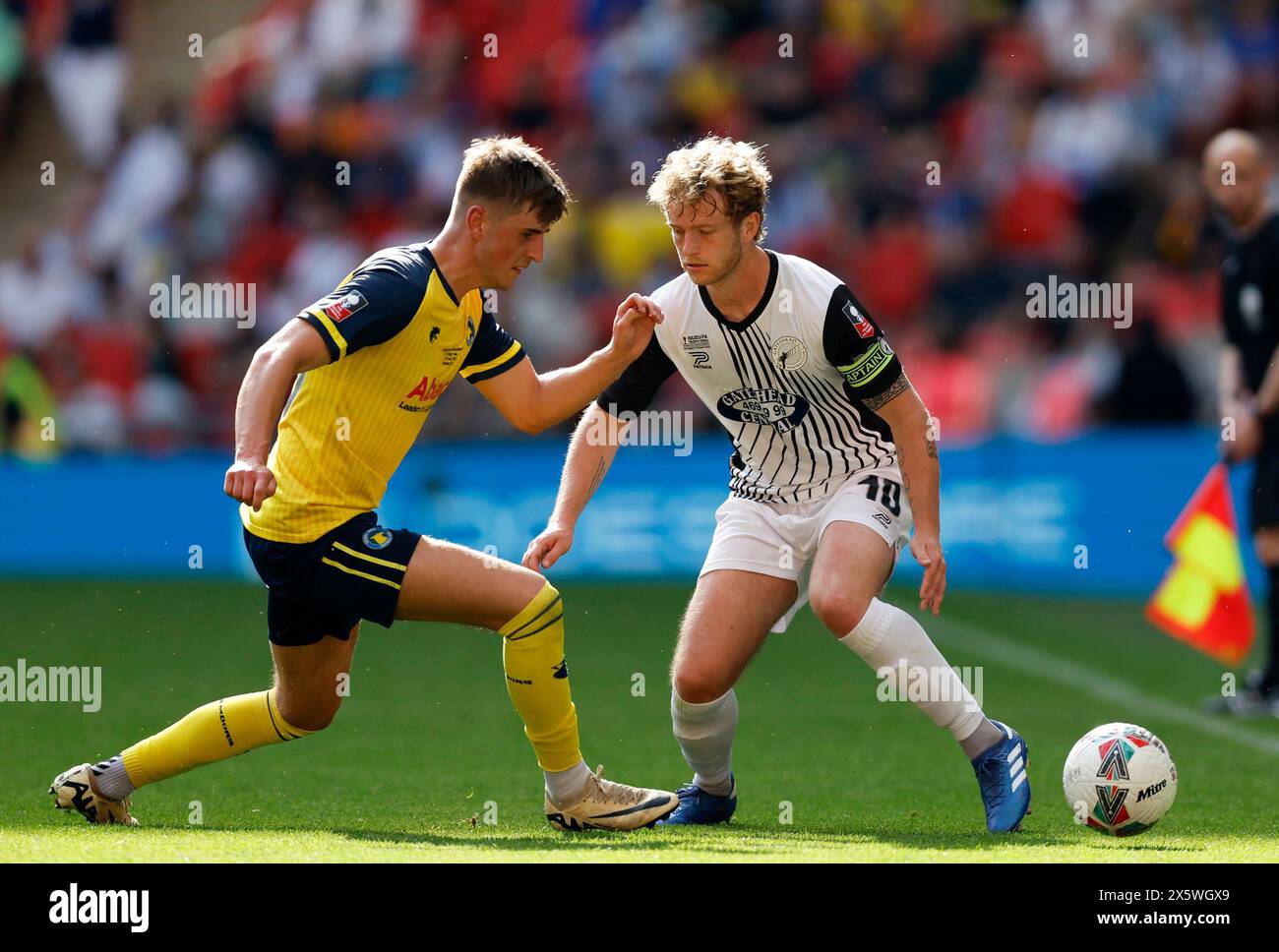 Gateshead's Greg Olley in action against Solihull Moors's Jay Benn ...