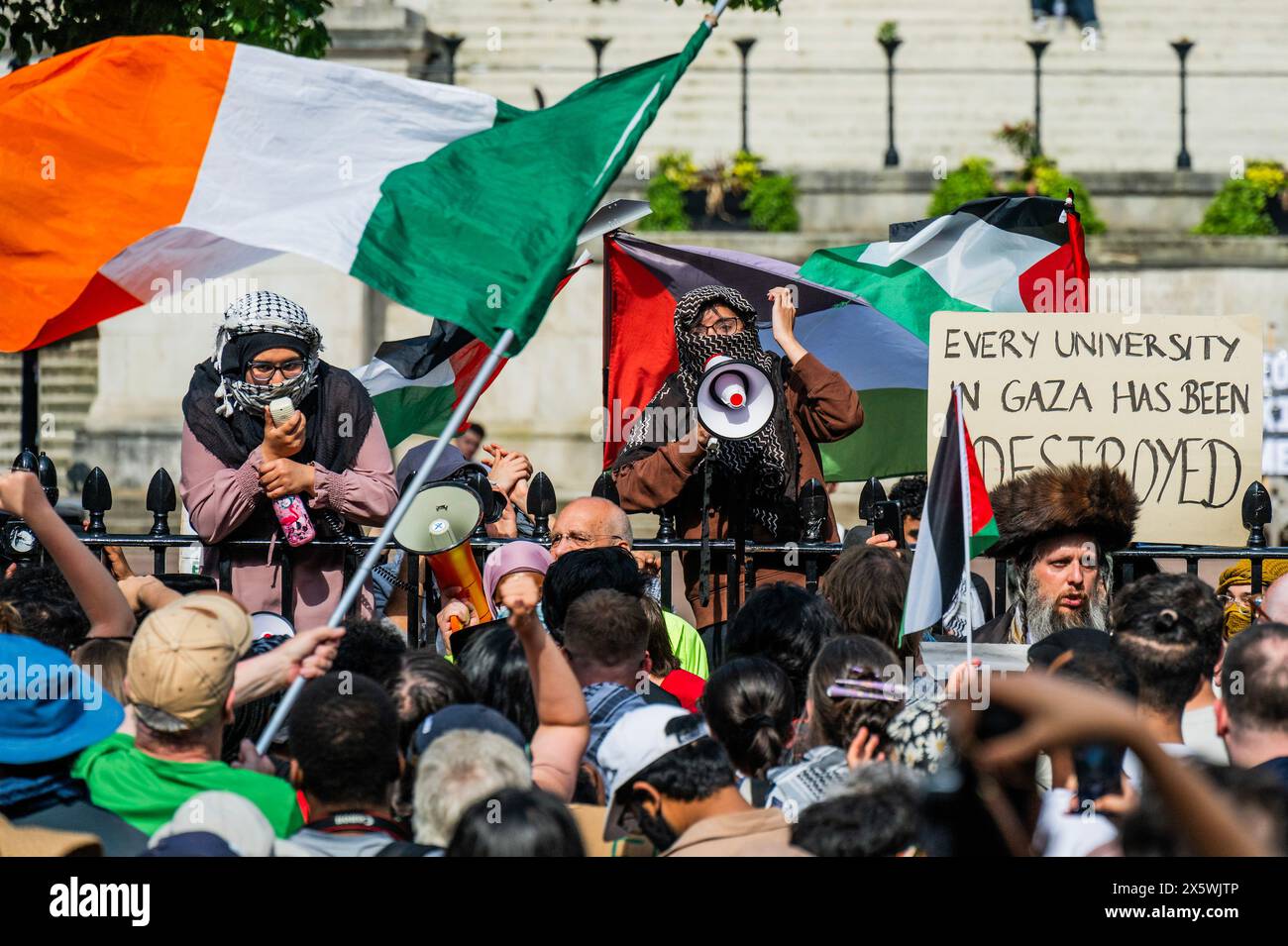 London, UK. 11th May, 2024. A march arrives, including orthdox Jews, to ...