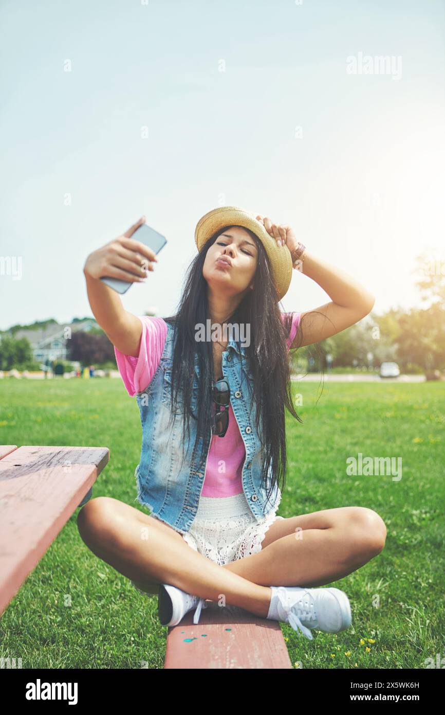 Outdoor, girl and selfie with attitude in park for profile picture on ...