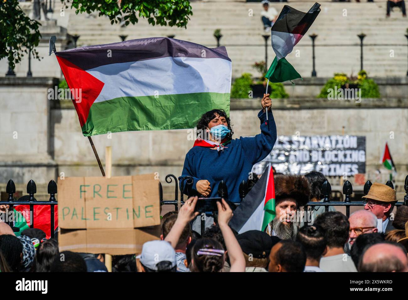 London, UK. 11th May, 2024. A march arrives to lend support to those ...
