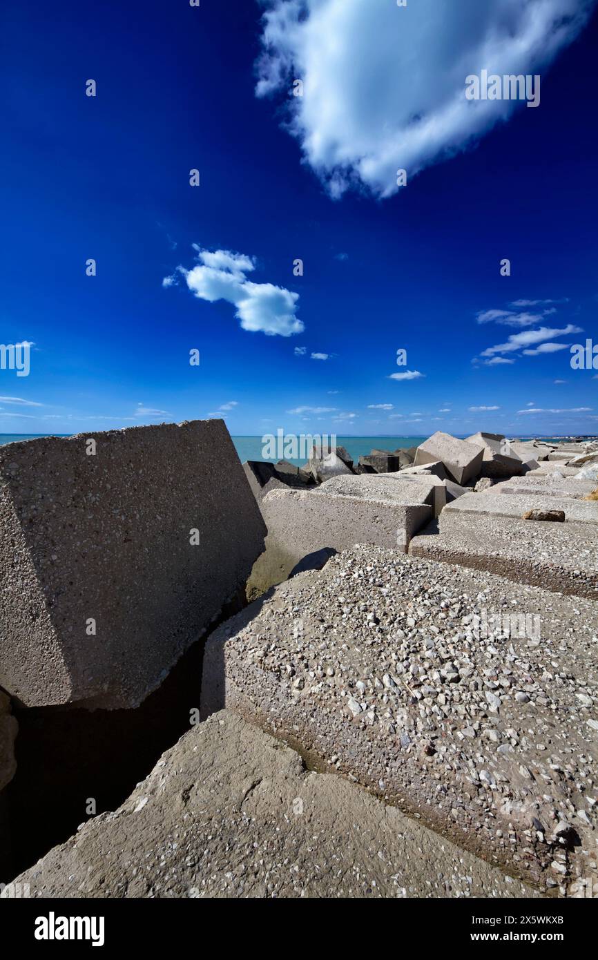 Italy, Sicily, Mediterranean Sea, concrete blocks in the port of ...
