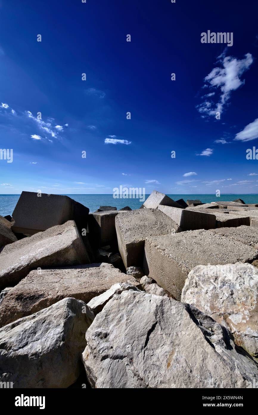 Italy, Sicily, Mediterranean Sea, concrete blocks in the port of ...